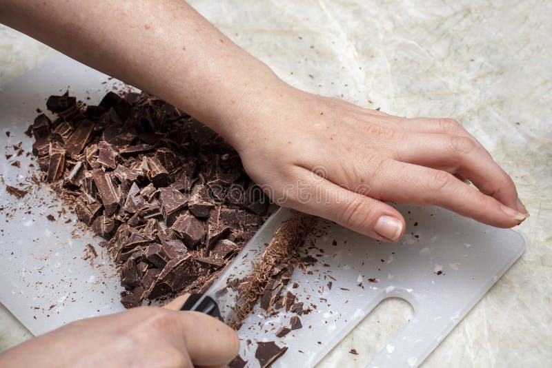 Hand Chopping Chocolate into Shavings and Chunks Stock Photo - Image of ...