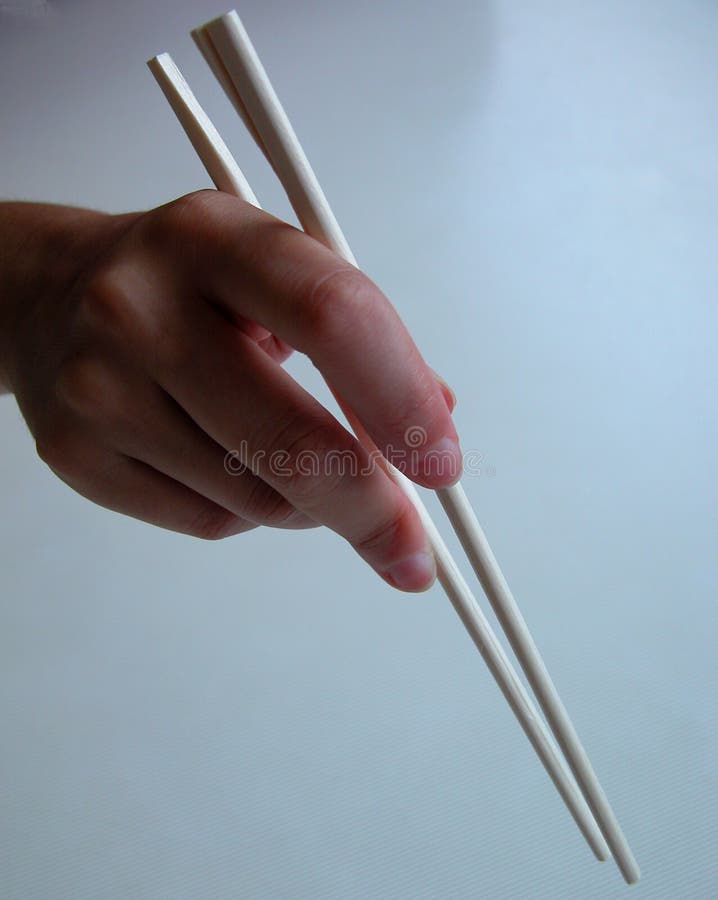 Hand with chopsticks stock photo. Image of wood, nails, skin - 13684