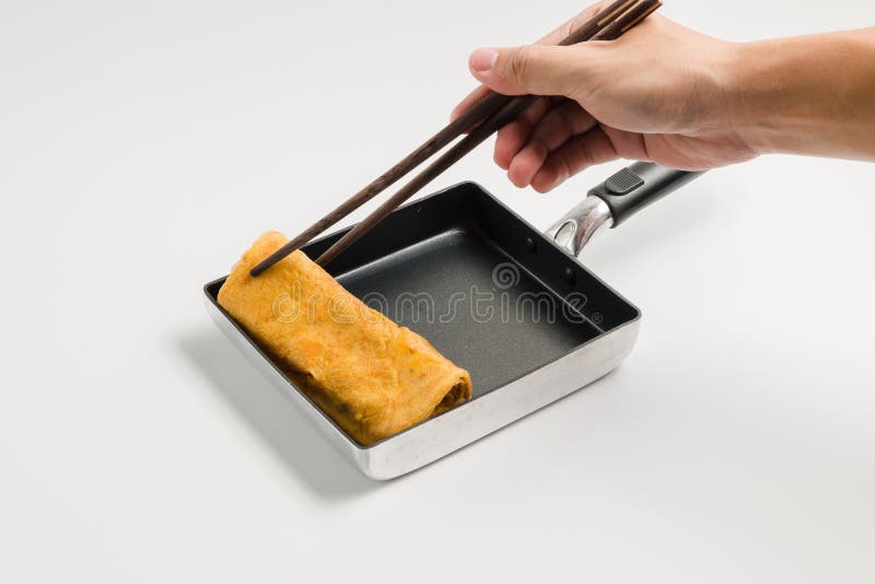 Hand with Chopsticks Grip Roll Fried Egg Stock Image - Image of right ...