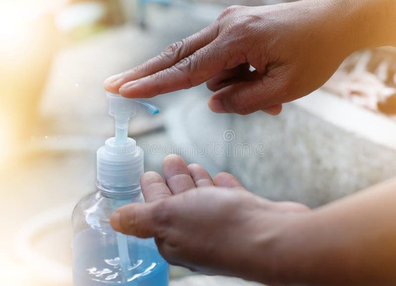 Hand Cleaning with Alcohol Gel To Kill Germs and Corona Viruses Which ...