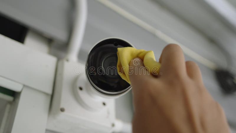 Hand Cleaning Home Security Camera. Stock Footage - Video of private ...