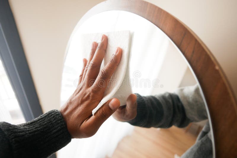 Hand Cleaning Mirror with a Tissue Stock Image - Image of protective ...