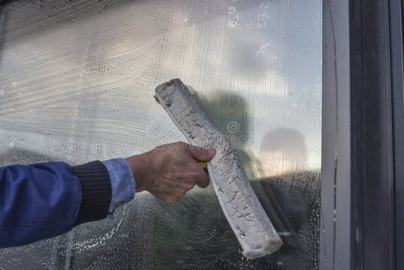 Hand Cleaning Window of a Building 2 Stock Photo - Image of blue ...