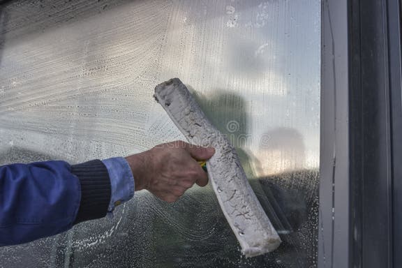 Hand Cleaning Window of a Building 2 Stock Photo - Image of blue ...