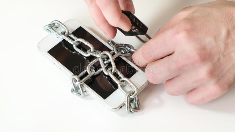Hand Close Lock with Chain on Smartphone. Close Up. Stock Image - Image ...