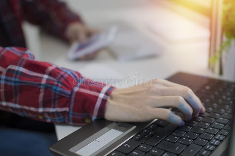 Hand closeup with computer stock image. Image of connectivity - 128616773
