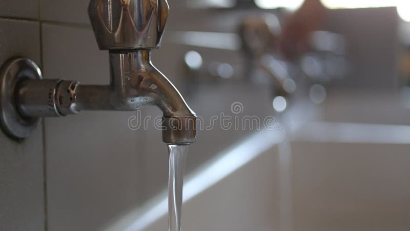Hand Closing the Water Tap in the Sink To Avoid Waste Stock Footage ...