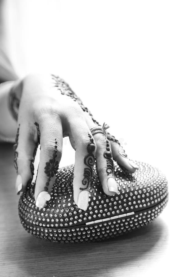 Hand and clutch stock image. Image of branded, henna - 53511649