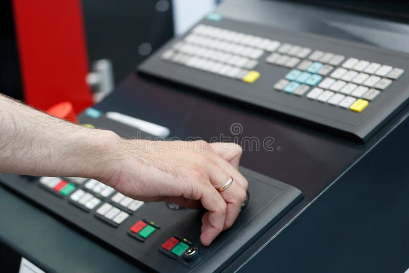 Hand of CNC Machine Operator on the Control Panel Stock Photo - Image ...
