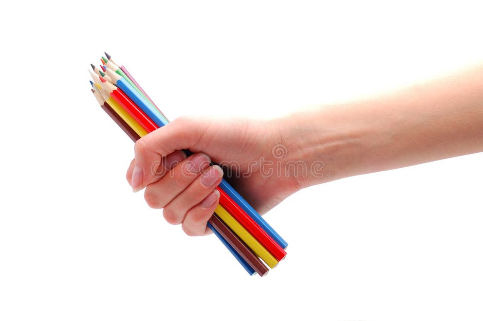 Hand with colored pencils stock image. Image of isolated - 11579685
