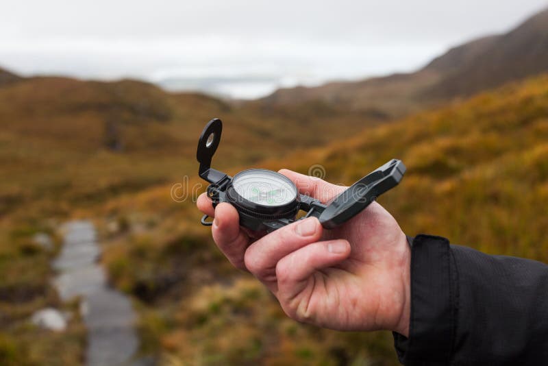 Hand with compass stock photo. Image of leisure, foliage - 35259242