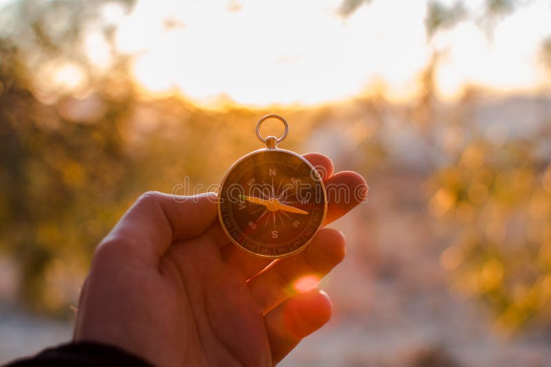 Compass in the Mountains in a Sunset Stock Image - Image of guide ...