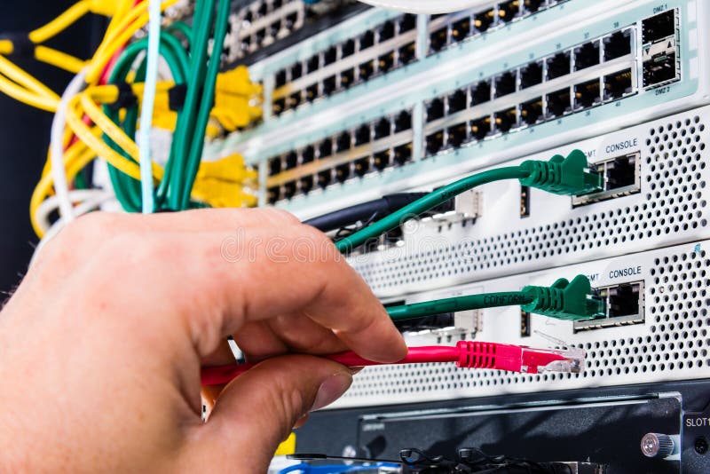 Hand of Computer Engineer Connecting Network Cable in Server Cab Stock Image - Image of ...
