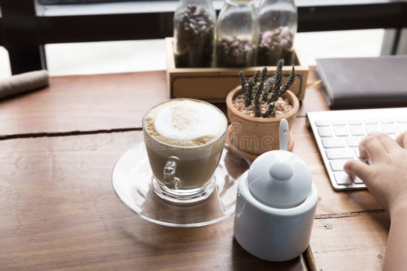 Hand on Computer Keyboard with Coffee Cup Stock Photo - Image of modern ...