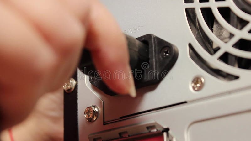 The Hand Connects an Electrical Wire To the Connector of the Computer`s ...