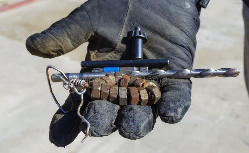 Hand in Construction Gloves Holds Equipment Stock Image - Image of ...