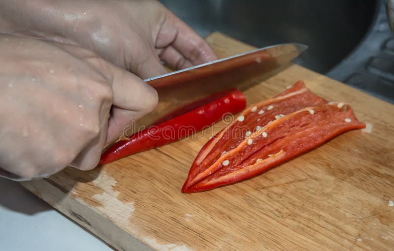 Hand Cook Cutting about Paprika Pepper Stock Photo - Image of person ...