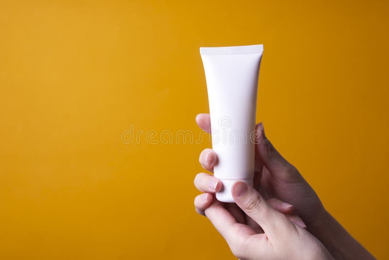 Packaging of Hand Cream in Female Hands Stock Photo - Image of mockup ...