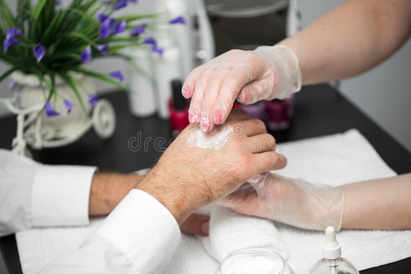 Hand Cream. Massage after the Manicure. Beauty Salon. Stock Photo ...