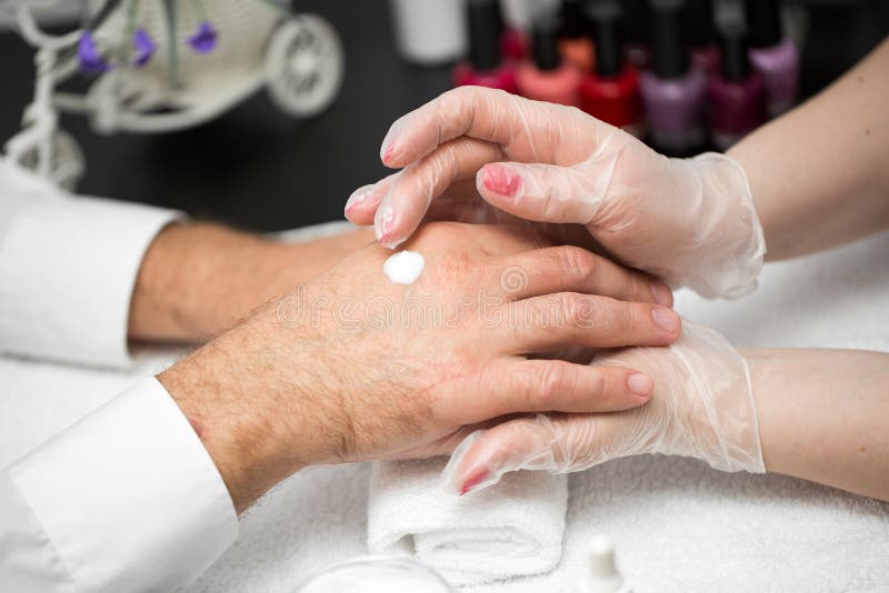 Hand Cream. Massage after the Manicure. Beauty Salon. Stock Photo ...