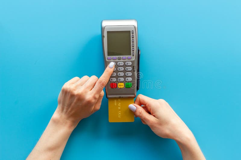 Hand with Credit Card on Pos Payment Terminal. Top View Stock Image ...