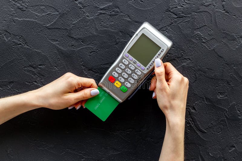 Hand with Credit Card on Pos Payment Terminal. Top View Stock Image ...