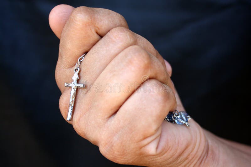 Hand with a cross stock image. Image of christ, catholic - 11006173