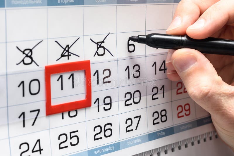 Hand Crosses Out the Next Day on the Wall Calendar Stock Image - Image ...