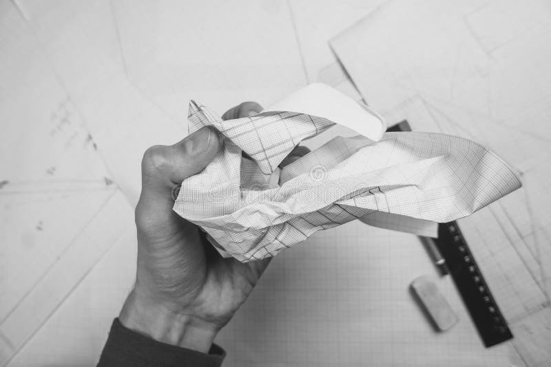 Hand Crumples the Paper Over the Table Stock Image - Image of folded ...