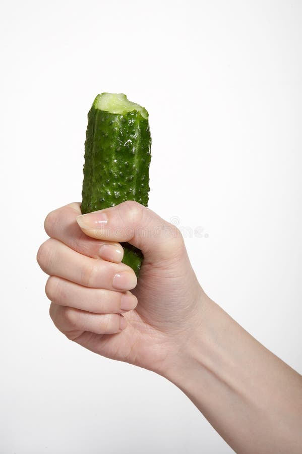 Hand With Cucumber Picture. Image: 1449499