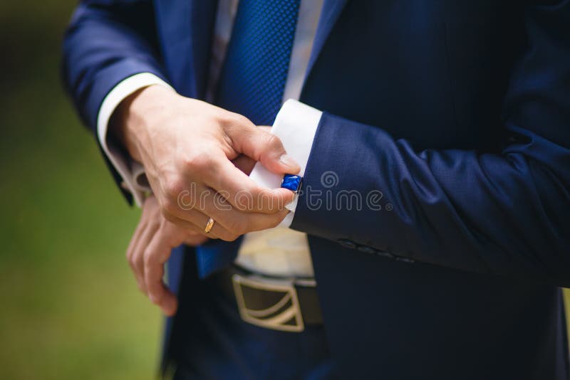 Hand with cufflink stock image. Image of necktie, businessman - 62218349