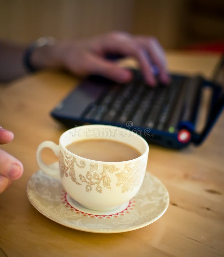 Hand with cup of coffee. stock image. Image of technology - 14515817
