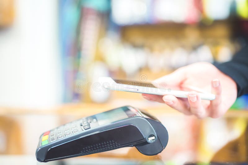 Hand of Customer Paying with Contactless Credit Card. Payment by Credit ...