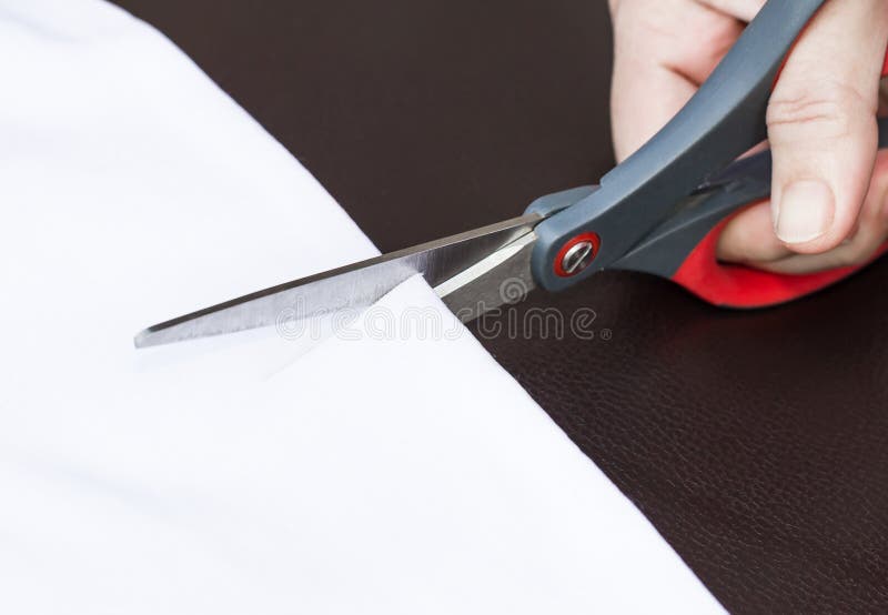 Hand cut white fabric stock image. Image of shape, manufacturing - 43349983