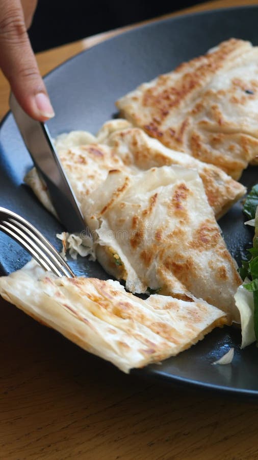 Hand Cutting a Paratha on a Palte Stock Footage - Video of healthy ...
