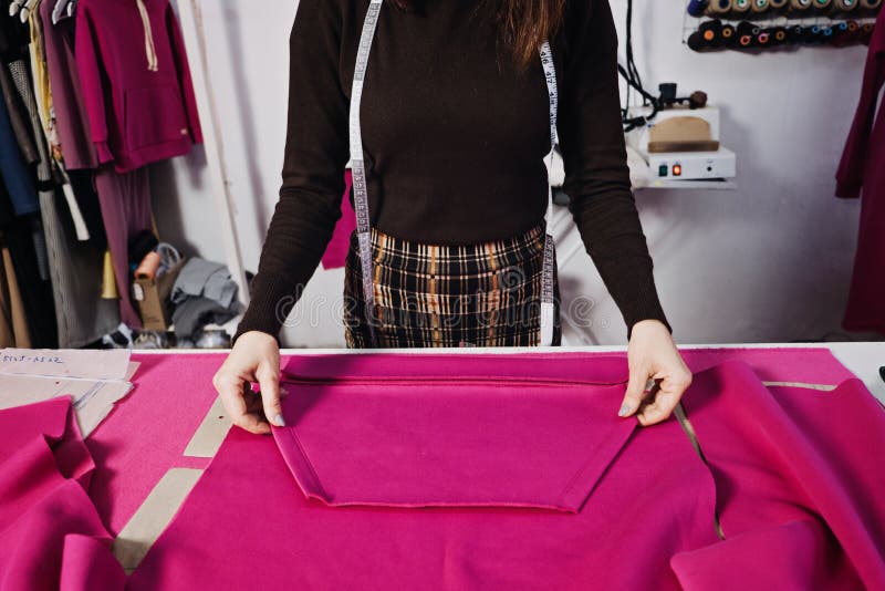 Hand Cutting Pattern and Fabric Pieces. Fashion Design Stock Photo ...