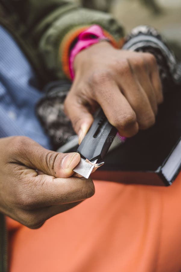 Hand cutting a pencil stock image. Image of hand, painter - 140002577
