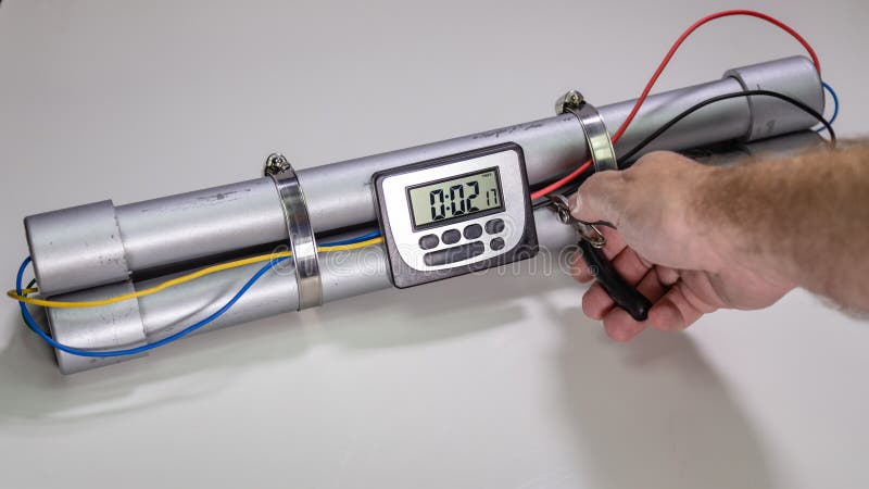 Hand Cutting Wire on Pipe Bomb on White Background Editorial Stock ...
