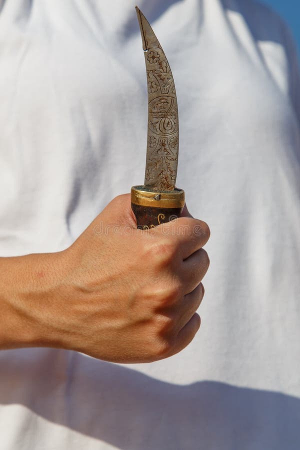 Serious Woman with Dagger stock image. Image of caucasian - 30050117