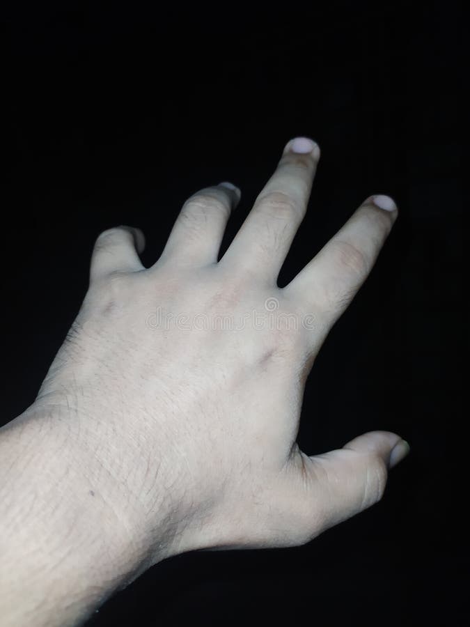 Hand in the dark stock photo. Image of dead, lamp, hand - 221915934