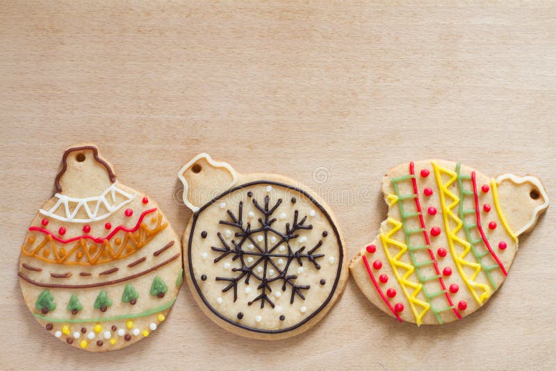 Hand Decorated Cookies in Shape of Baubles on Kitchen Board, Christmas ...
