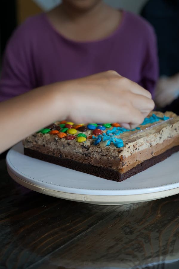 Hand Decorating Birthday Cake. Celebrate at Home Concept Stock Photo ...