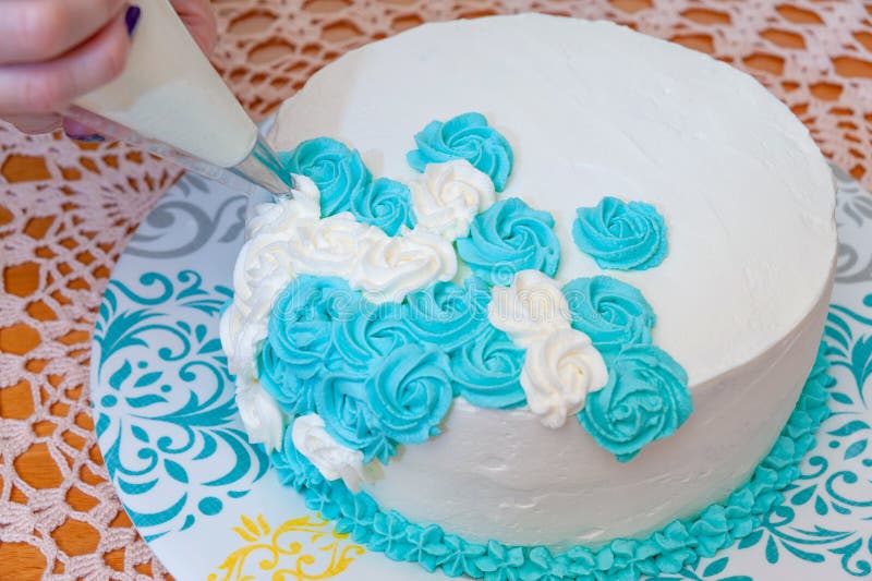 Hand Decorating Birthday Cake with Icing. Making Homemade Cake. Top ...