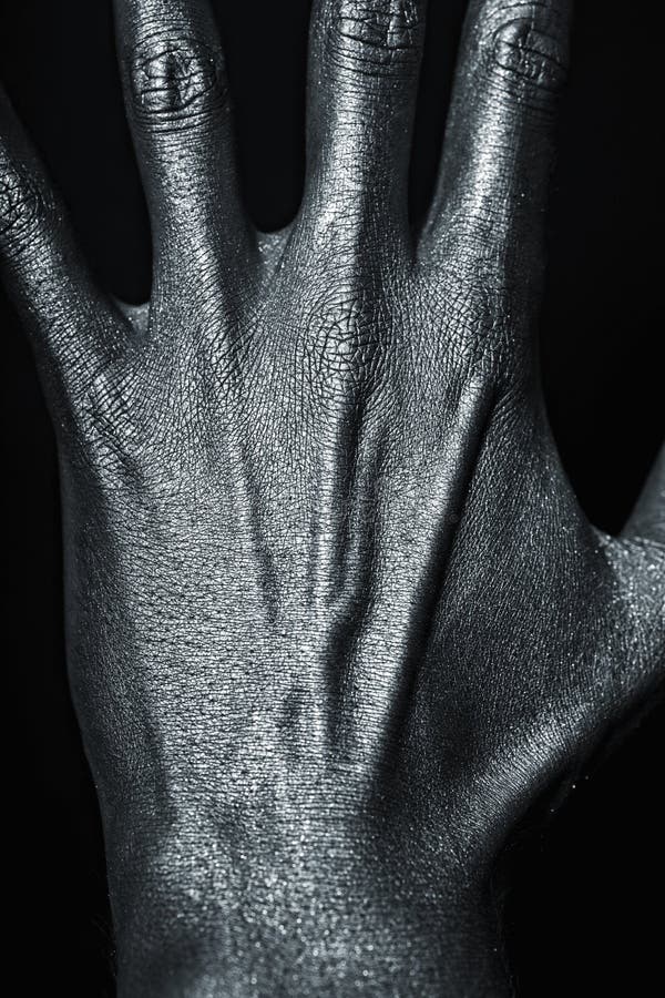 Hand im silbernen Lack stockfoto. Bild von mann, verfassung - 15632678