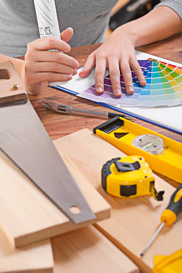 Hand of Designer on Color Palette and Other Tools Stock Photo - Image ...