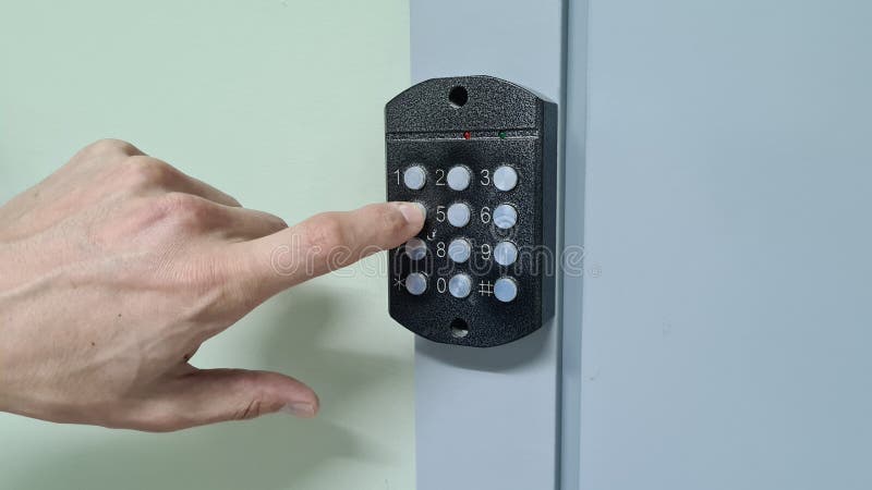The Hand Dials the Code on the Combination Door Lock. Editorial Stock ...