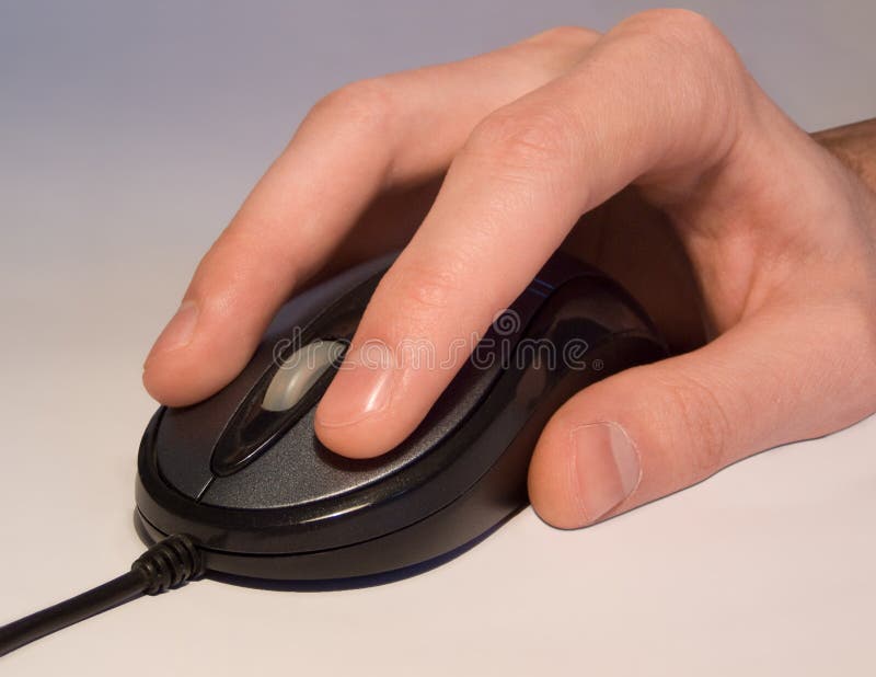 Hand bedient een muis stock afbeelding. Image of duim - 4260085