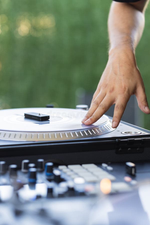 Hand of a DJ Touching the Turntable of the Mixing Console Stock Photo ...