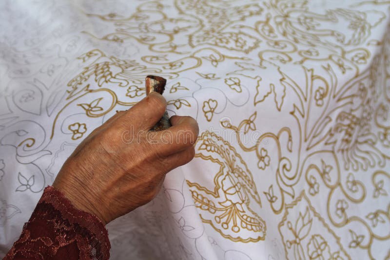 Hand Do Drawing the White Fabric with Batik Motif Using Canting a Tool ...