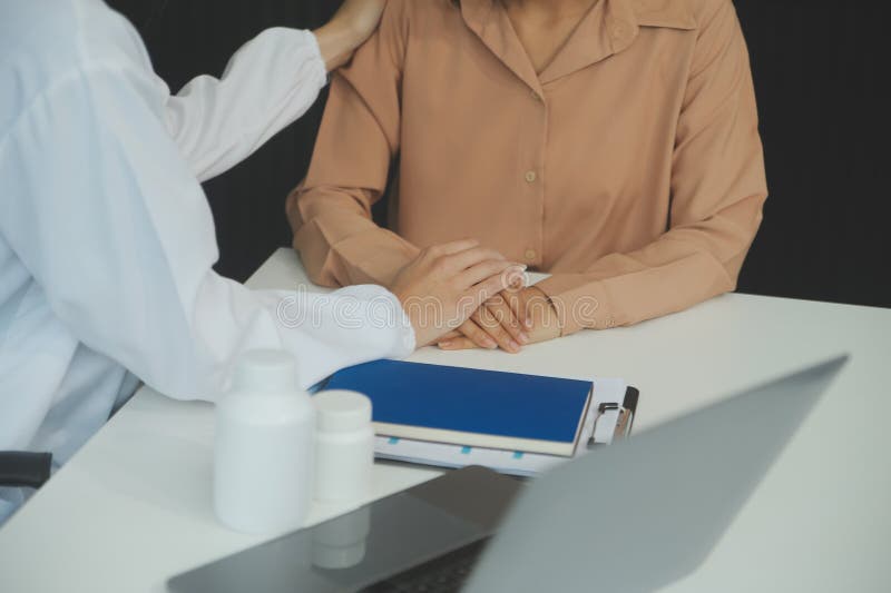 Hand of Doctor Reassuring Her Female Patient Stock Image - Image of ...